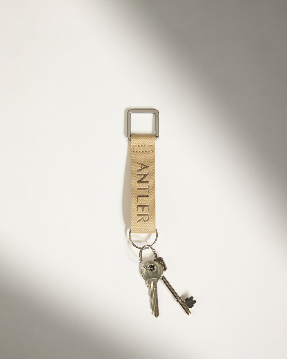 Icon Keyring in Beige | Keychain & Travel Bag Accessories – Antler ...