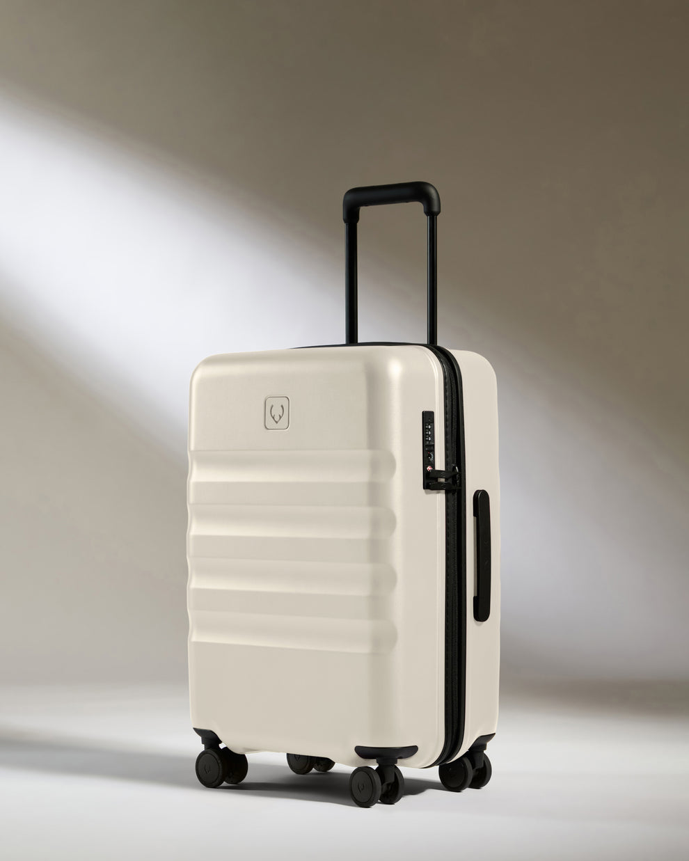 Large Carry-on Luggage in Taupe - Icon Stripe | Lightweight & Hard ...