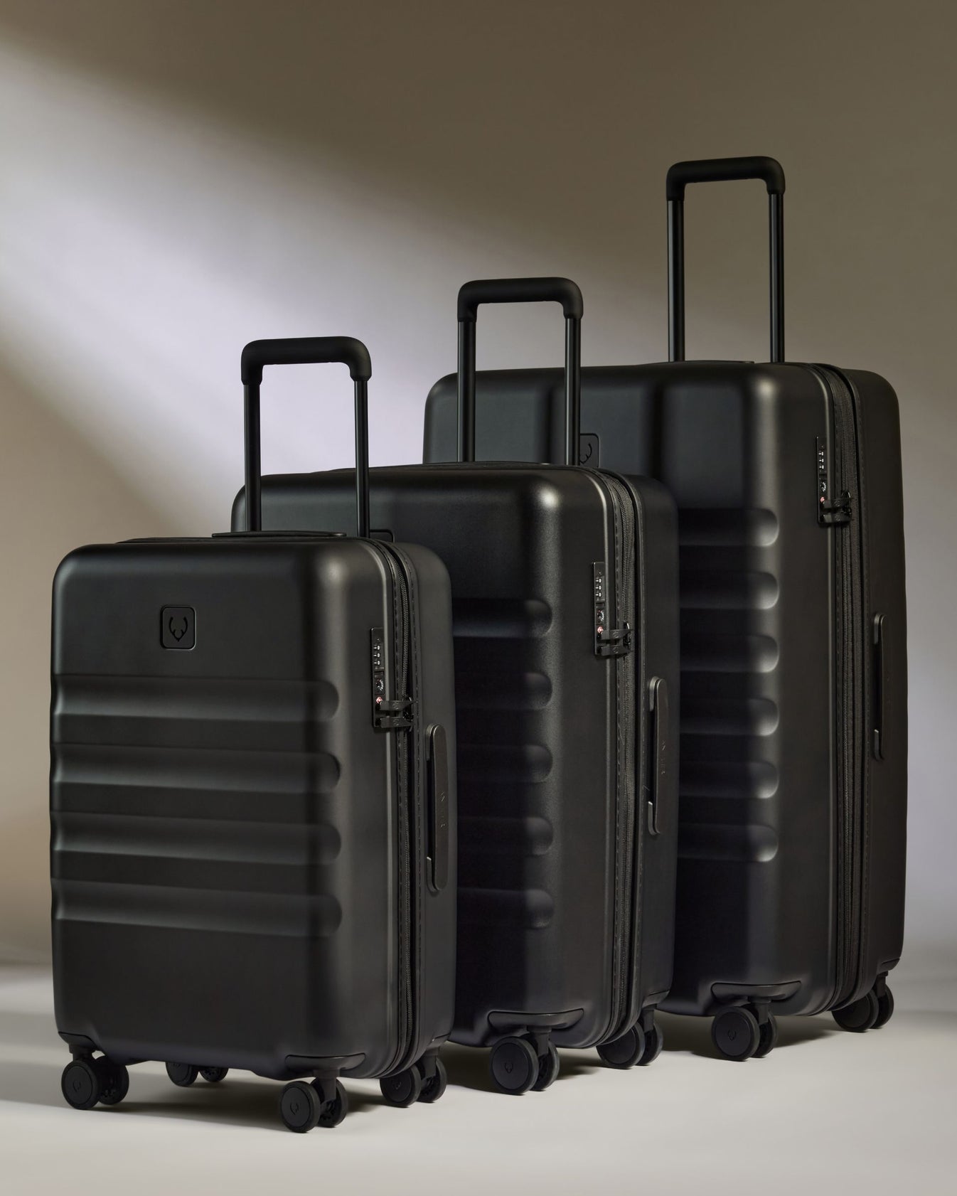 Large Carry-on Luggage Set in Black - Icon Stripe | Lightweight & Hard ...