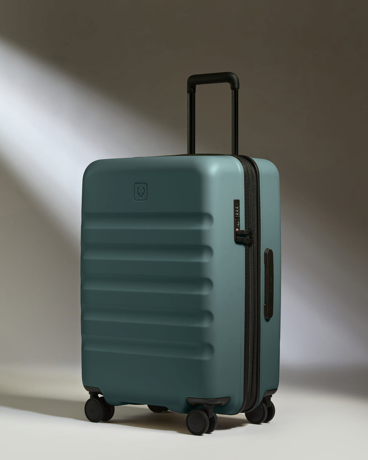 Medium Luggage in Blue - Icon Stripe | Lightweight & Hard Shell ...
