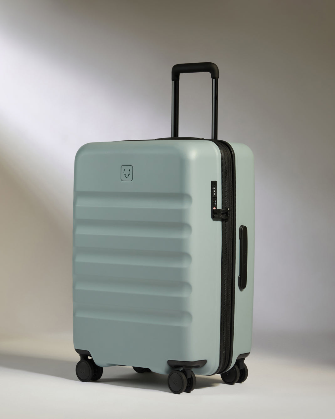 Medium Suitcase in Blue - Icon Stripe | Lightweight & Hard Shell ...