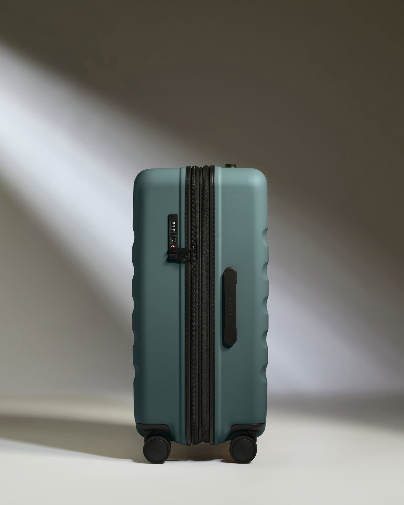 Medium Luggage in Blue - Icon Stripe | Lightweight & Hard Shell ...
